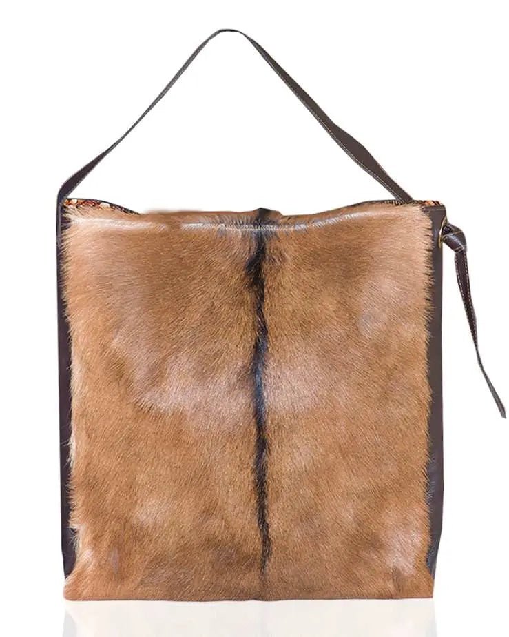 How to Take Care of Your Precious Luxury Cow Hide Bag - Adele Dejak